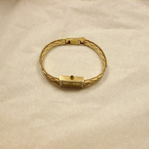 Beautiful 14 Kt Solid Gold and Diamond Cristian Geneve Quartz Ladies With Chevron Pattern Band ...