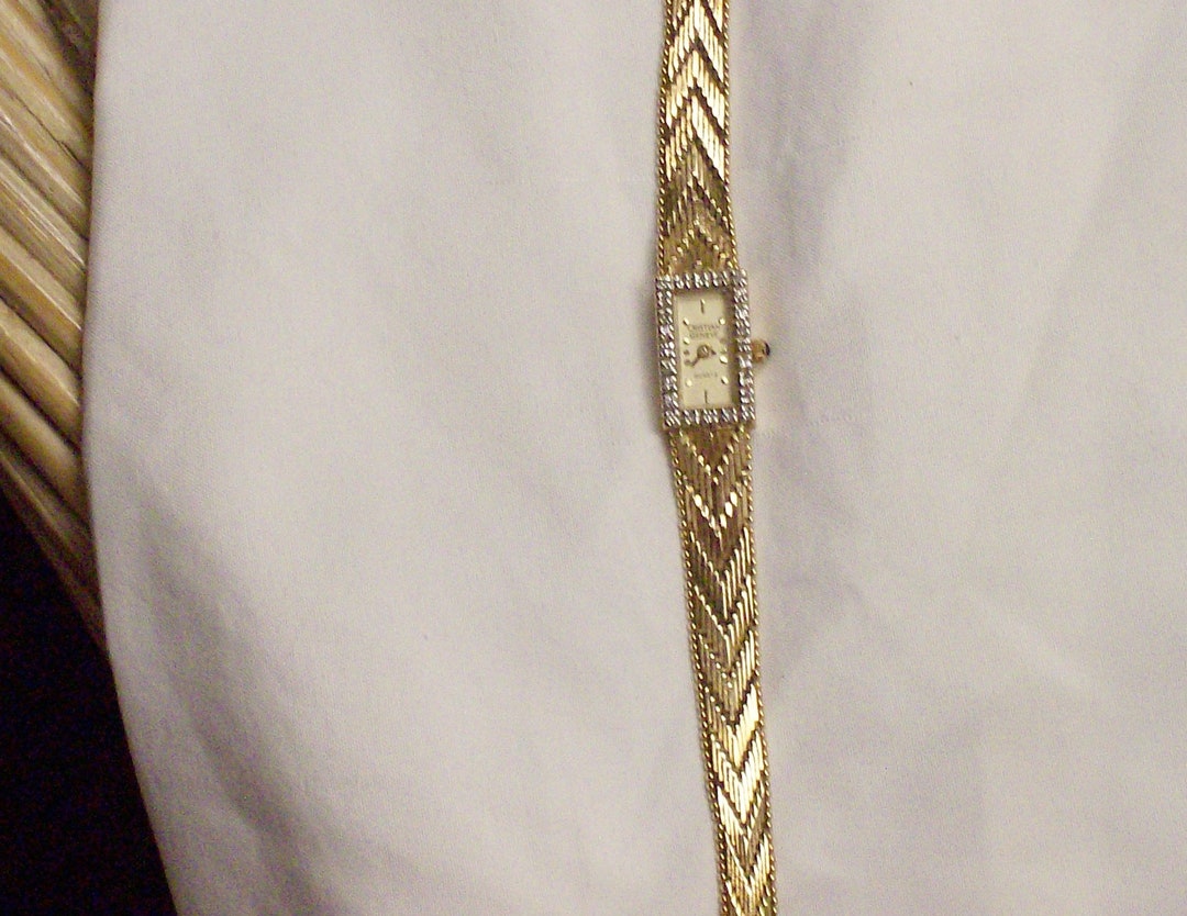 Beautiful 14 Kt Solid Gold and Diamond Cristian Geneve Quartz Ladies With Chevron Pattern Band ...
