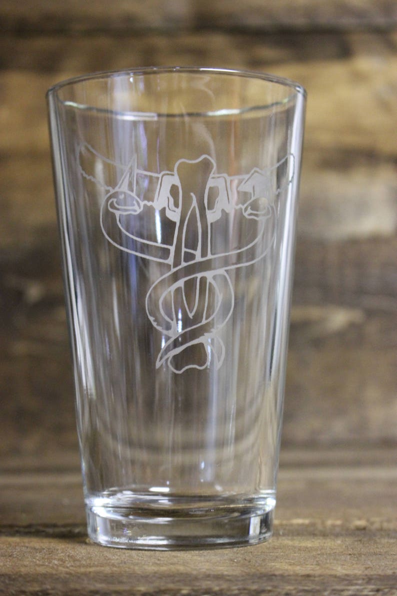 Sawbones Podcast Logo Tumbler Sawbones Podcast Logo Pint Glass Justin ...