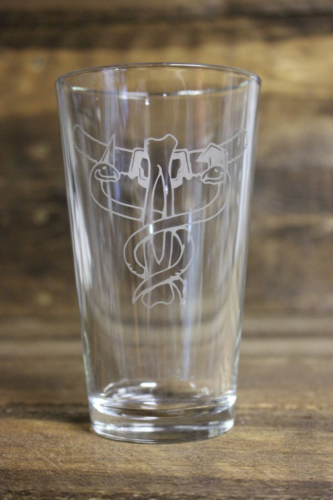 Sawbones Podcast Logo Tumbler Sawbones Podcast Logo Pint Glass Justin ...