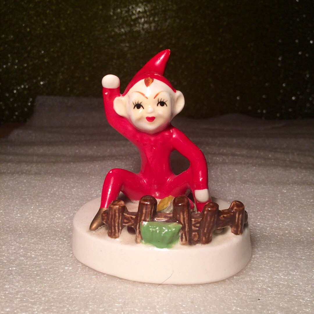 Vintage Hand Painted Red Pixie Elf Sitting in a Garden Waving Figurine ...