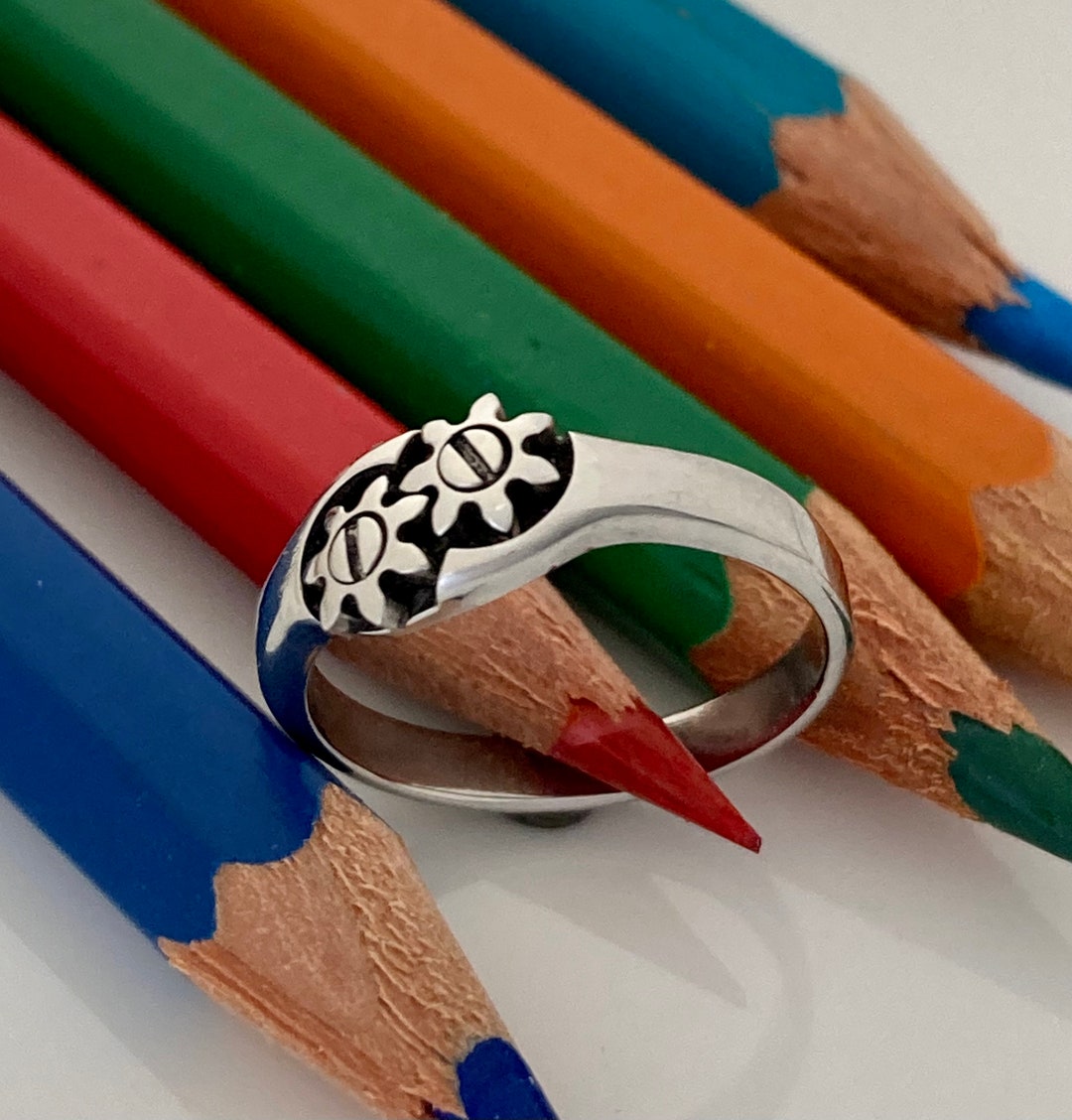 Forever in Steel. Linked Cogs in a Simple Kinetic Gear Mechanism for ...