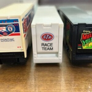 Richard Petty and Kyle Petty Set of 3 Semi-tractor Trailer Race Car ...