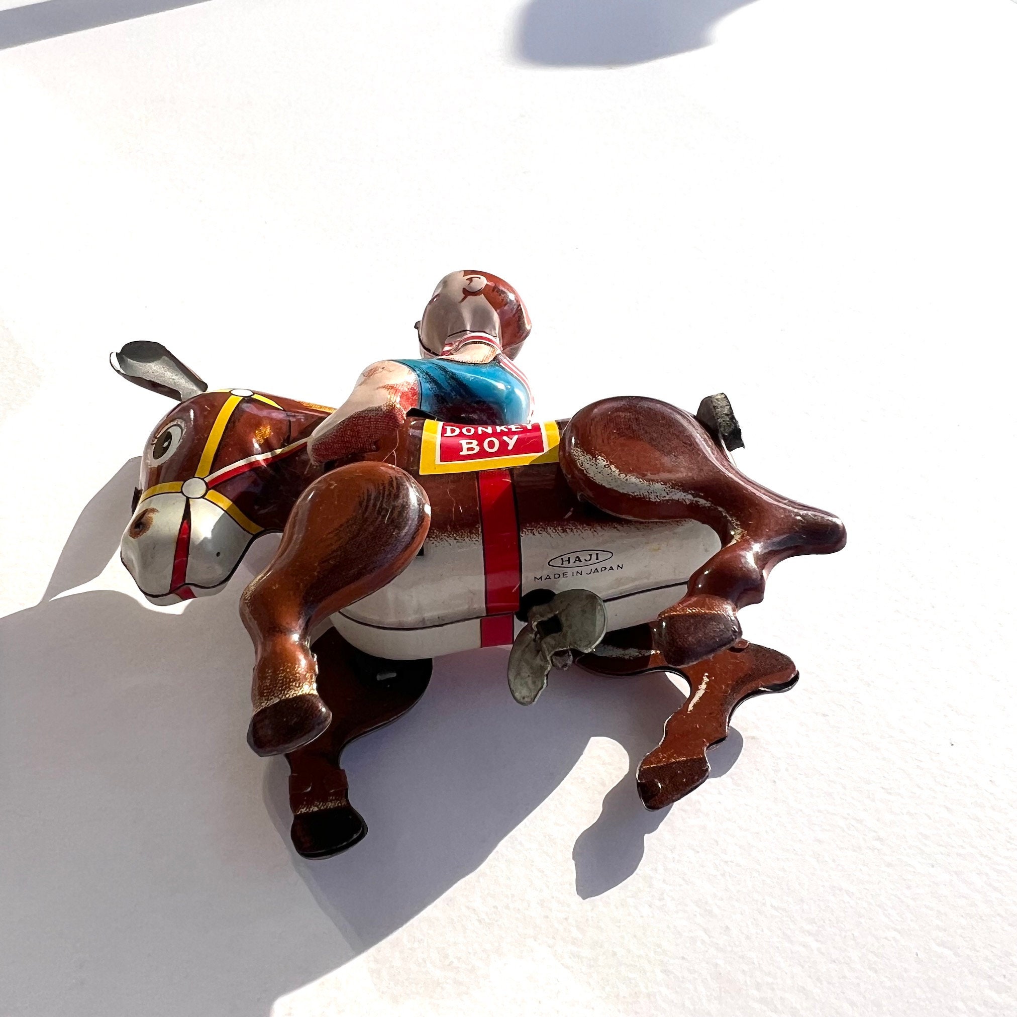 Vintage 1950s Wind up Donkey Boy Tin Toy in Box Working Red White Blue ...