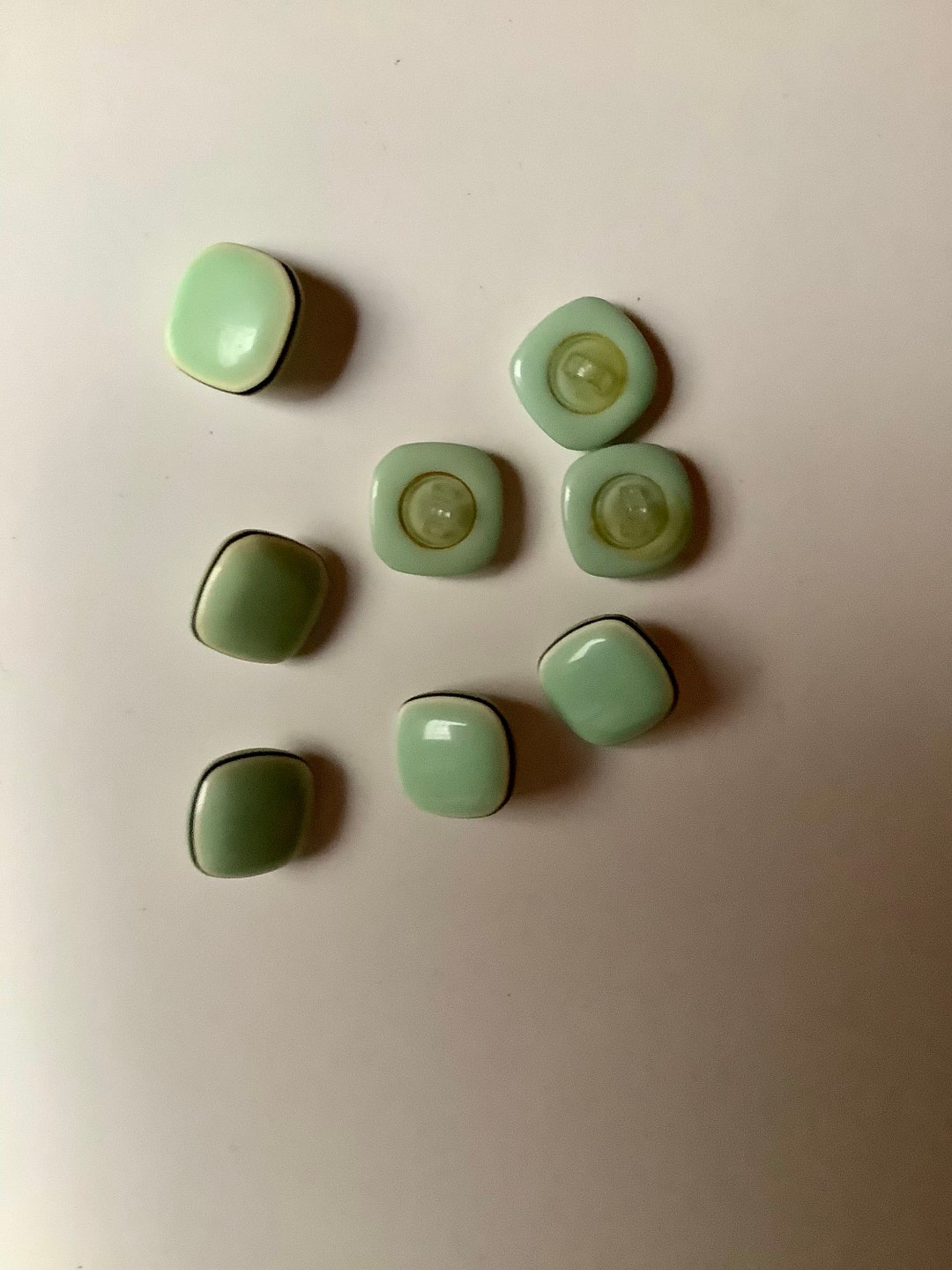 Set of Soft Green/turqoise Buttons. Shaped Like Pillows With A Black ...