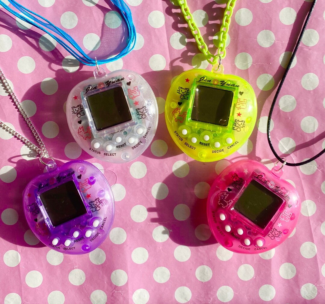 5 Colours! Cute Pet Game Necklace or Keychain in See Through Purple ...