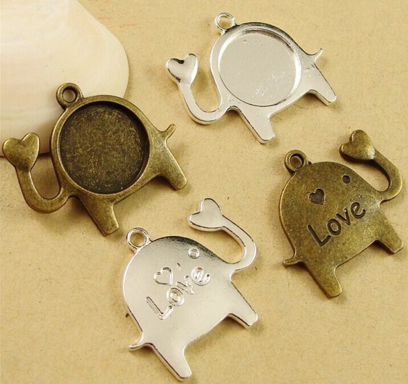 Silver Tone/antique Silver Tone/antique Bronze Elephant Love - Etsy Silver Tone/antique Silver Tone/antique Bronze Elephant Love - Etsy