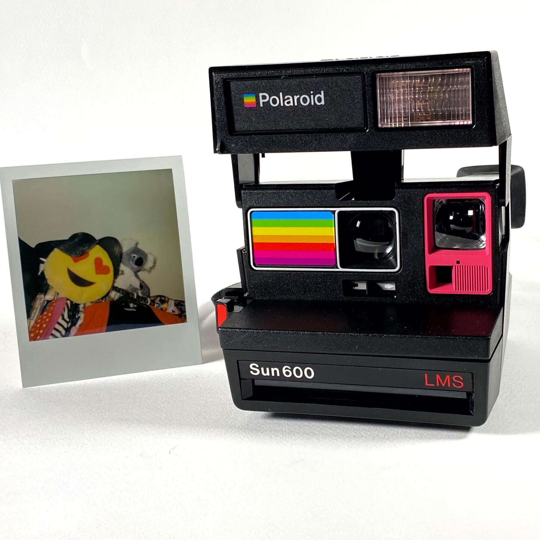 Polaroid Sun 600 with Upcycled pink and rainbow face - Refreshed ...
