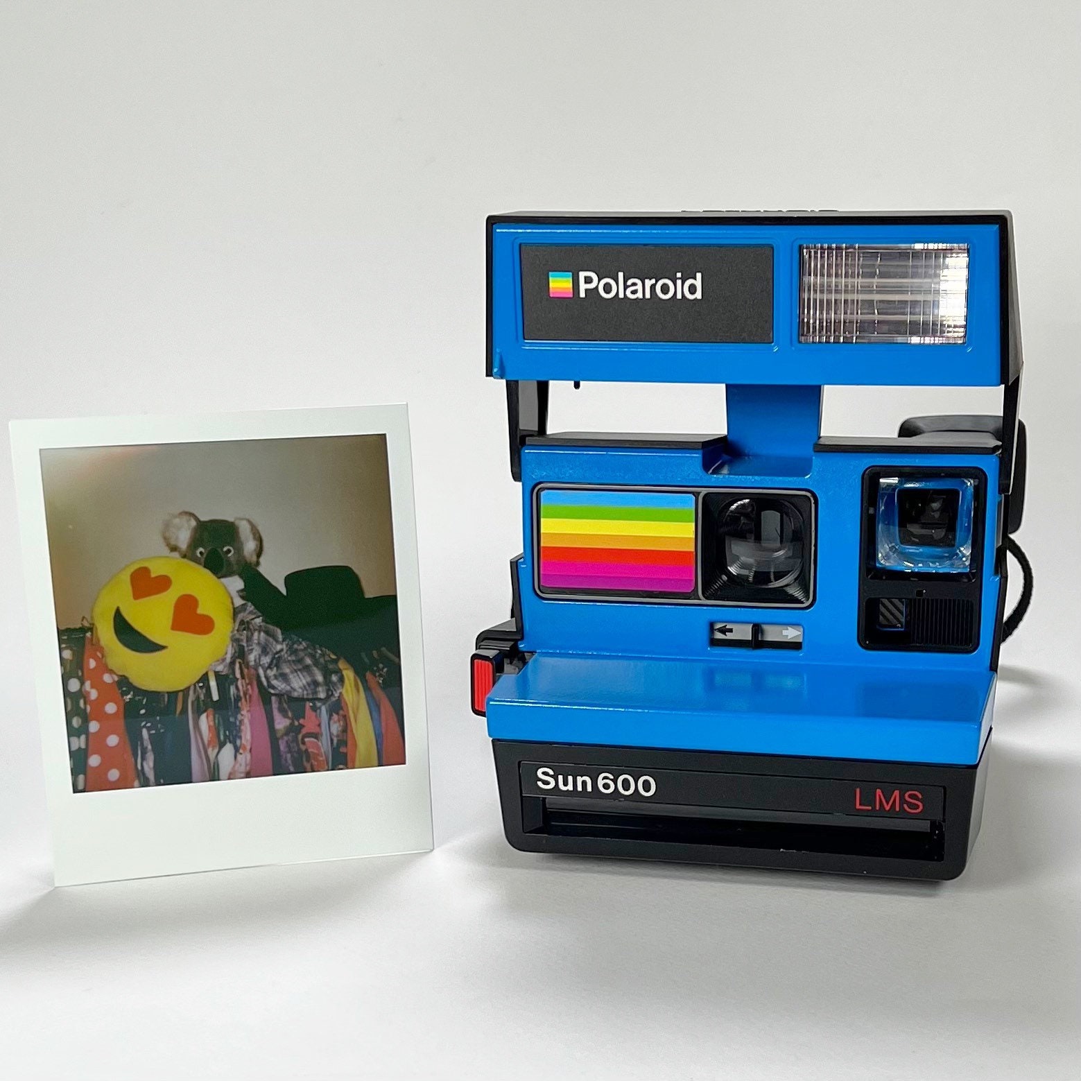 Polaroid Sun 600 with Upcycled blue and rainbow face - Refreshed ...