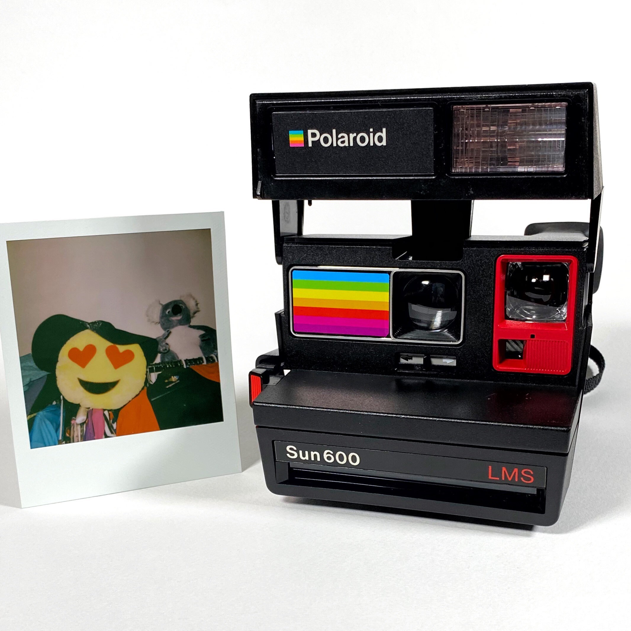 Polaroid Sun 600 with Upcycled red and rainbow face - Refreshed ...