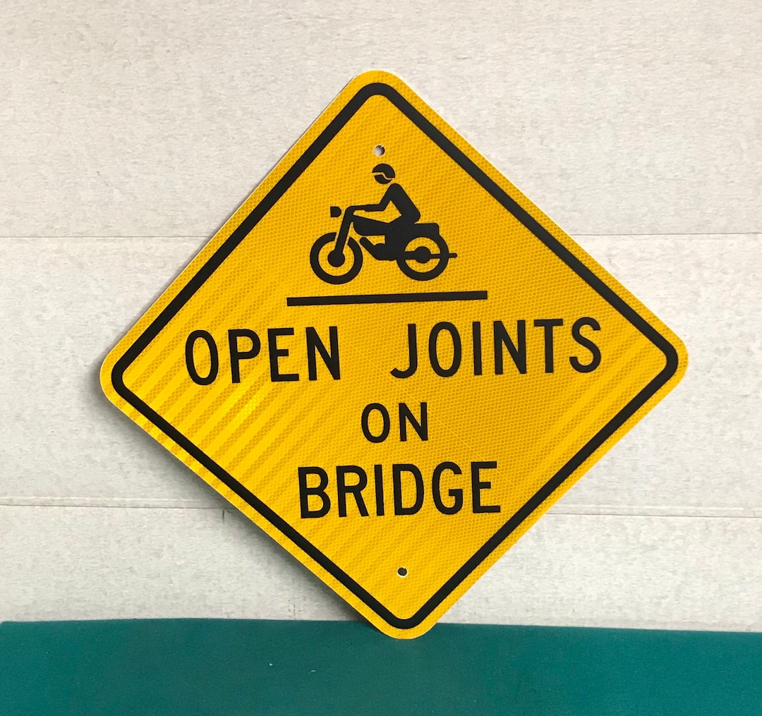 Authentic open Joints on Bridge Motorcycle Road Warning Sign ...