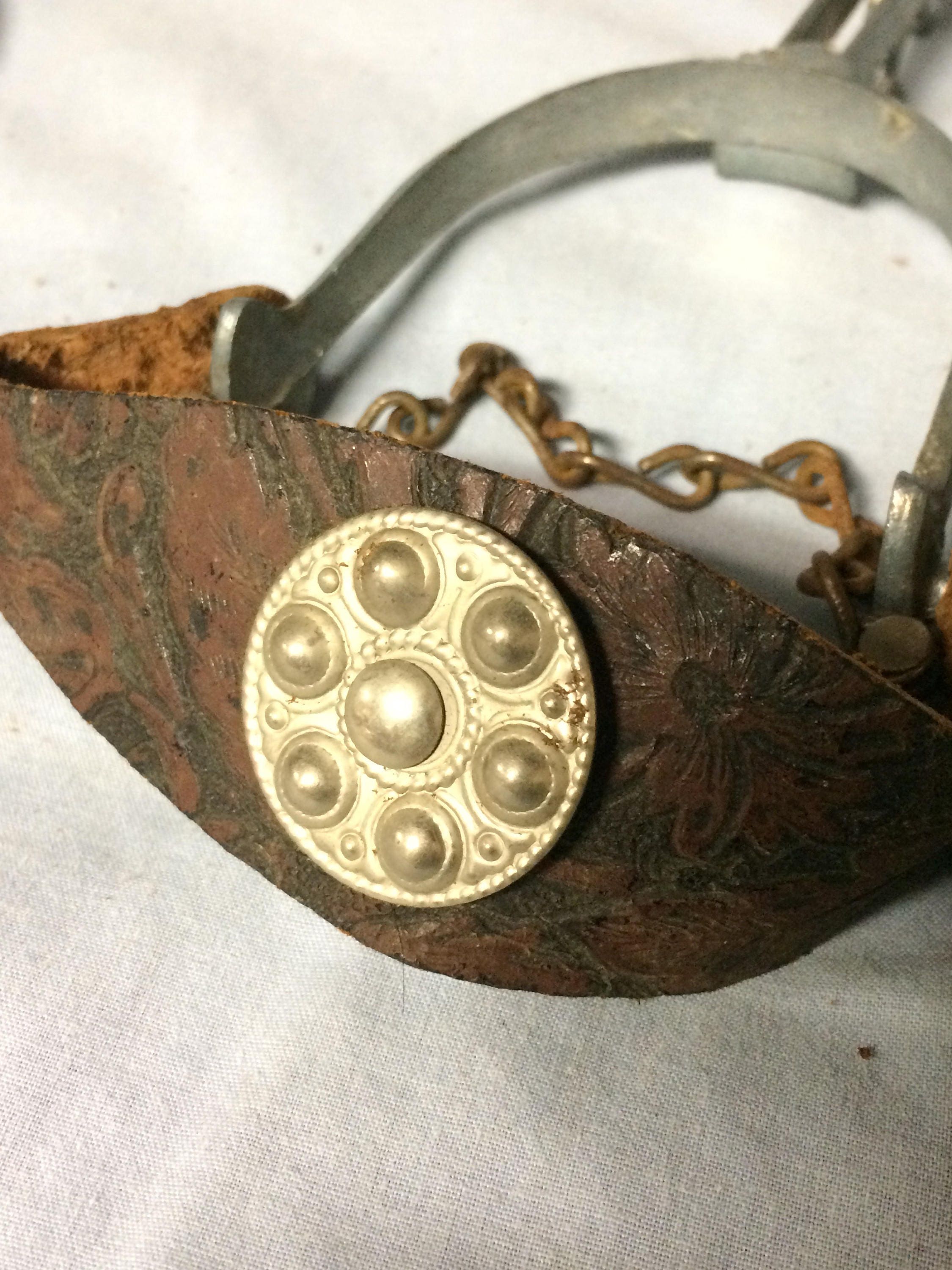 Two sets of Toy Metal Spurs with Embossed Leather Straps, 1950's