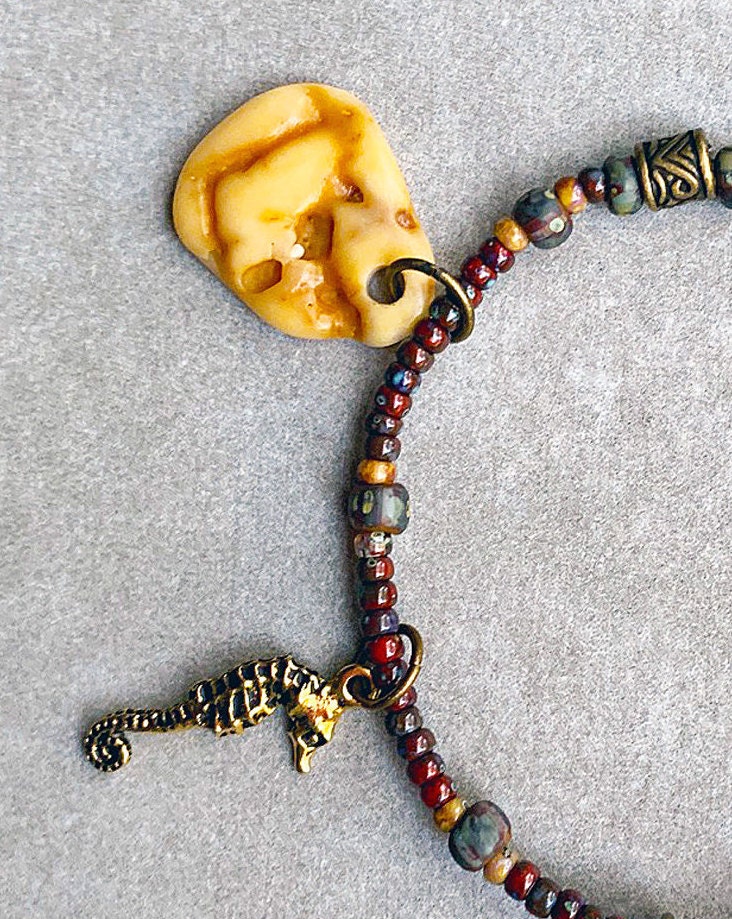 3 Outer Banks Shells Are Strung on Elastic With Brass Anchor - Etsy