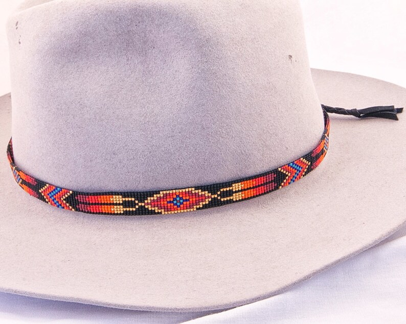 Beaded Two Feather Hatband in Reds and Gold on a Black Background. This ...