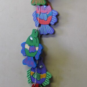 5 Colorful Wooden Fish on a String. | Etsy