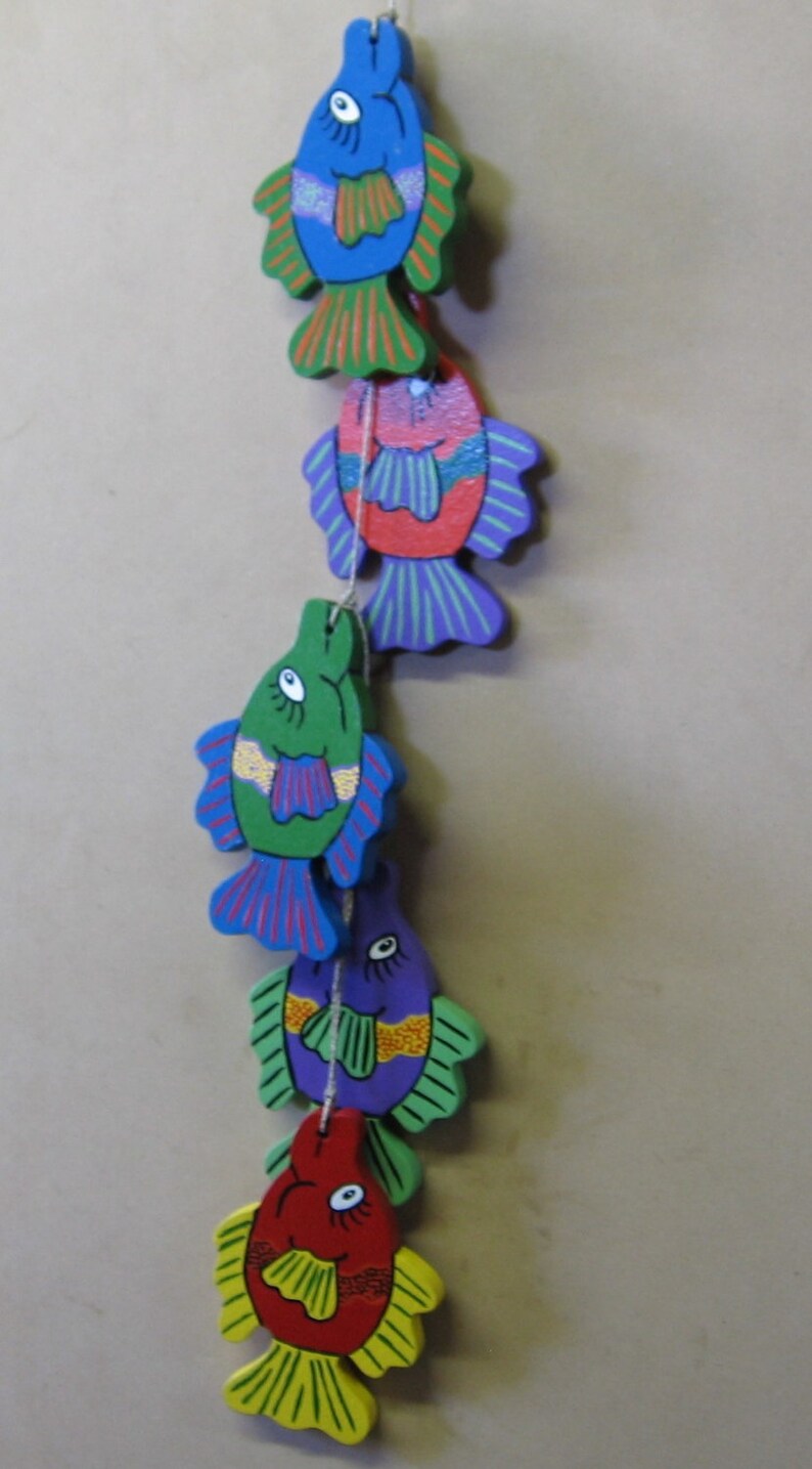5 Colorful Wooden Fish on a String. - Etsy