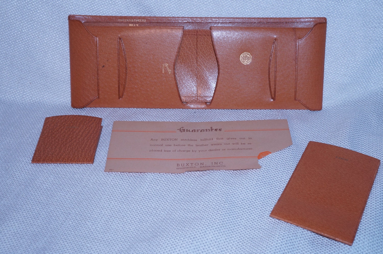 1940's Buxton stitchless pigskin wallet embossed with U.S. Motors logo ...