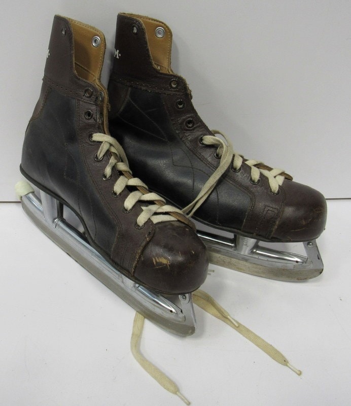 Vintage 1960s black and brown leather CCM hockey skates, Canada, Size 10