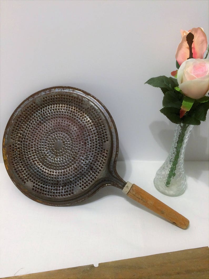 Flat Metal Utensil With Wooden Handle, Round Utensil With Patina Used ...