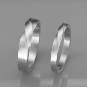 14k Rose Gold Mobius Wedding Band Set | His and Hers Mobius Ring Set ...