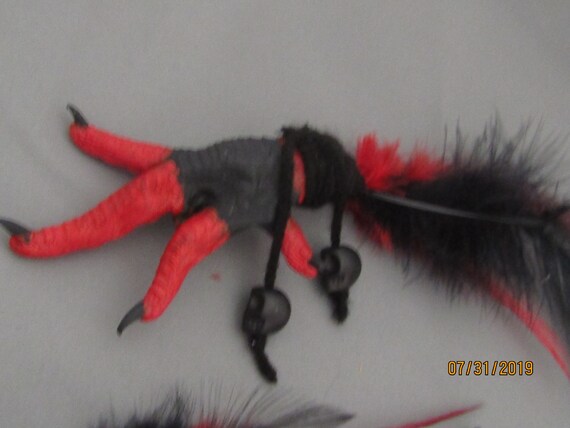 Reversing Red and Black Chicken Foot with Skulls | Etsy