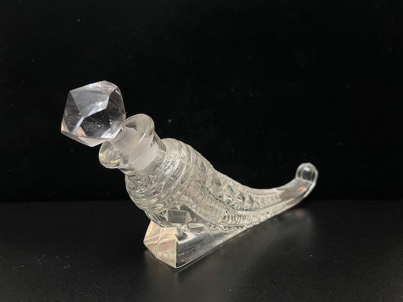 This is a Clear Glass Perfume Bottle in a scimitar - Etsy