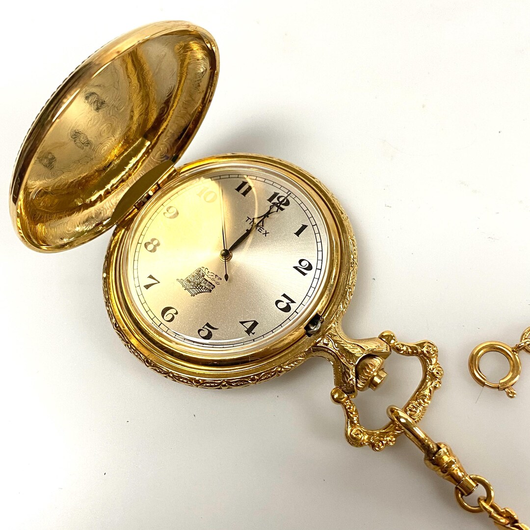 V061 Vintage Timex Taiwan Gold Tone Pocket Watch on 13