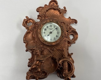 Antique Cupid Clock - Etsy