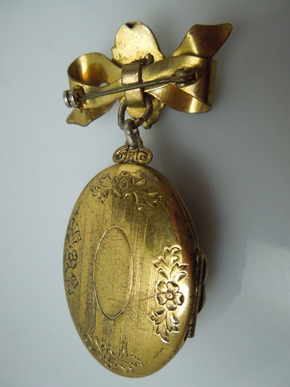 s884 Vintage Large Gold Coro Locket Rhinestones Bow L… - Gem