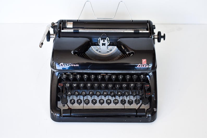 PERFECTLY WORKING Typewriter - Black Optima Elite - Professionally ...