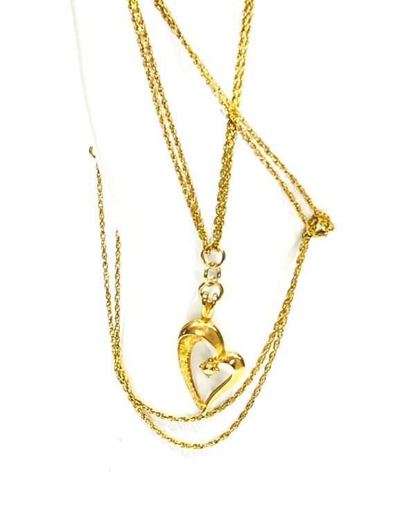Designer gold pendant necklace store