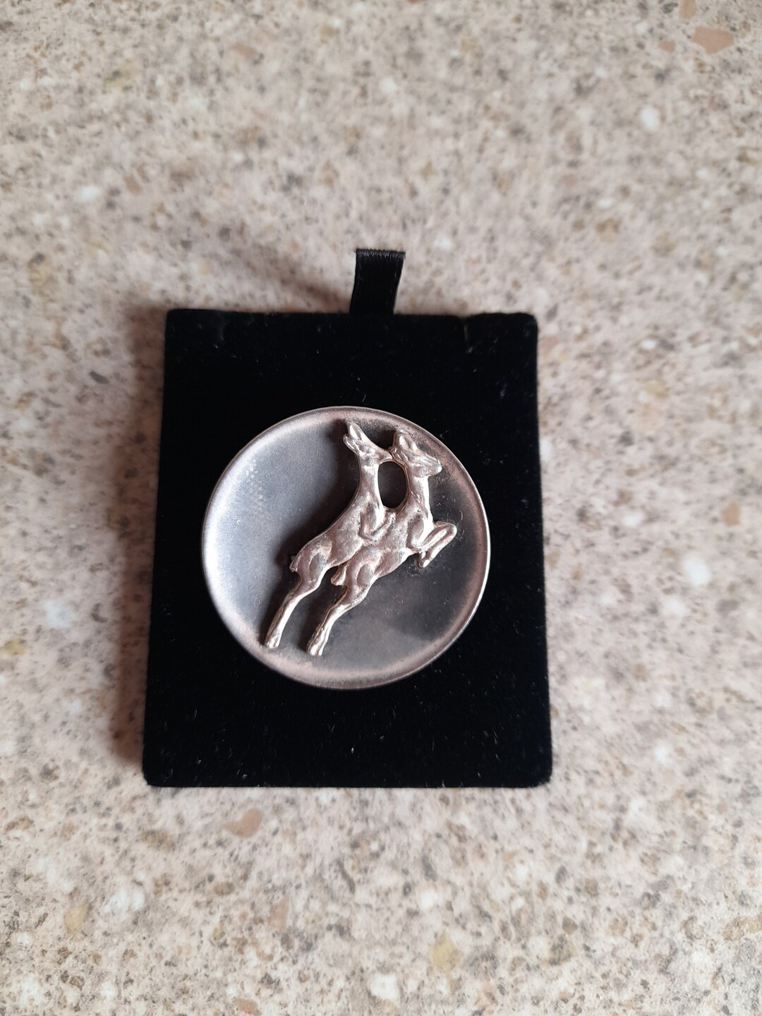 VINTAGE SIMBA BROOCH Circular White Metal South African Brooch Leaping ...