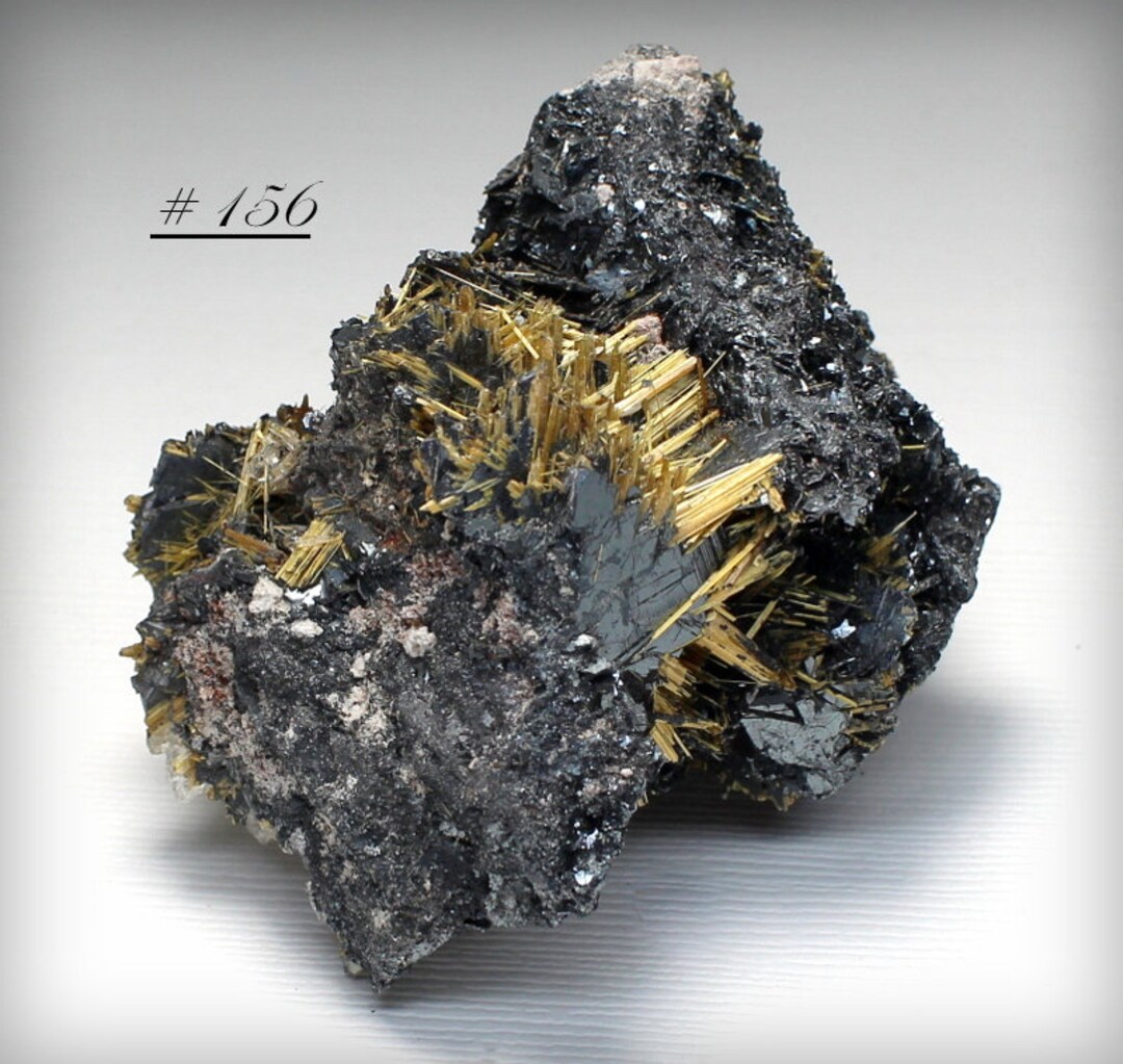 Jackstraw Golden Rutile Needles in Bright, Shiny Hematite - Mineral ...