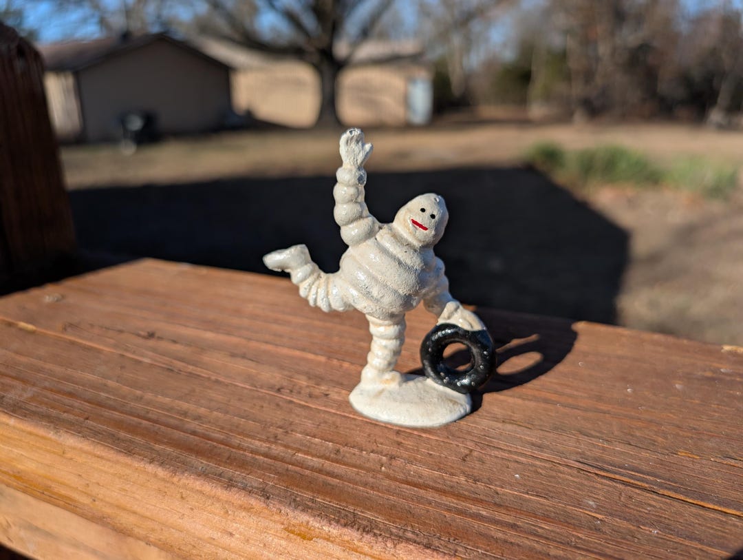 Small Cast Iron Hand Painted Running MICHELIN Man Bibendum Figurine ...