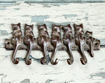 Metal cat tails | Etsy