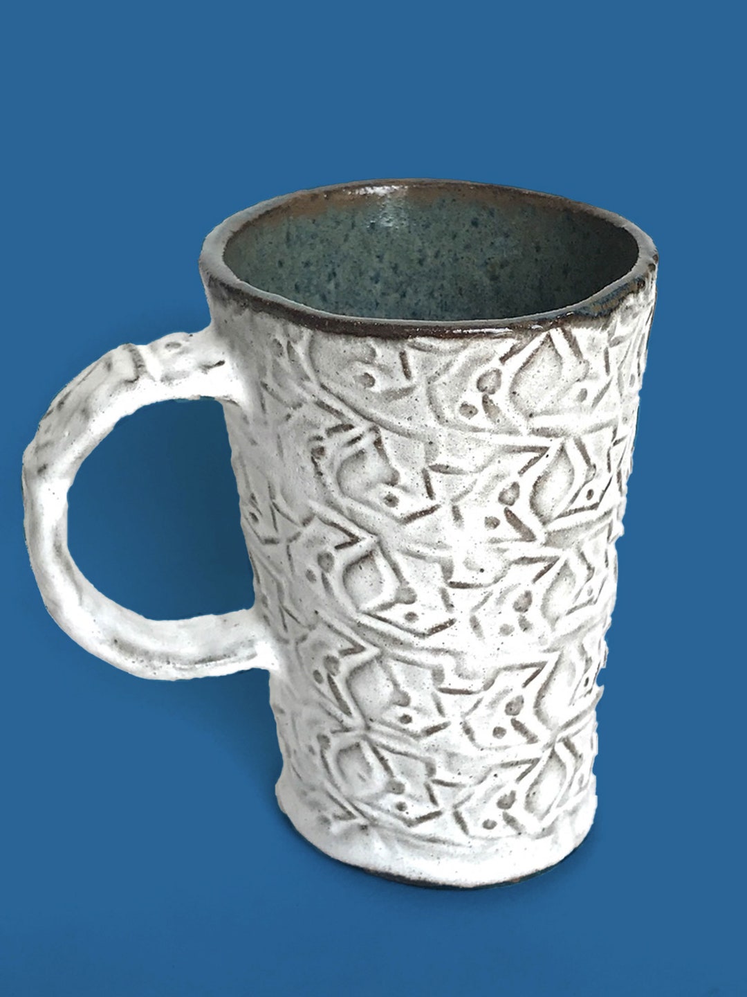 Large White, Blue Rutile Stoneware Coffee Mug, "os Coxae" Design ...