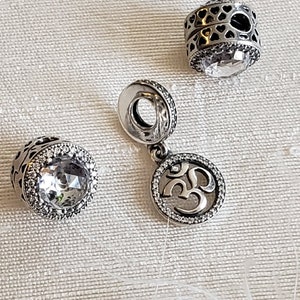 Authentic Pandora Om Symbol Dangle Charm Sterling Encrusted Clear Cubic ...