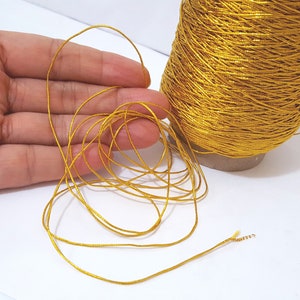 Approx 0.8mm Width 250 Yds 228 Mtr Gold Stretch Metallic Elastic Thread ...