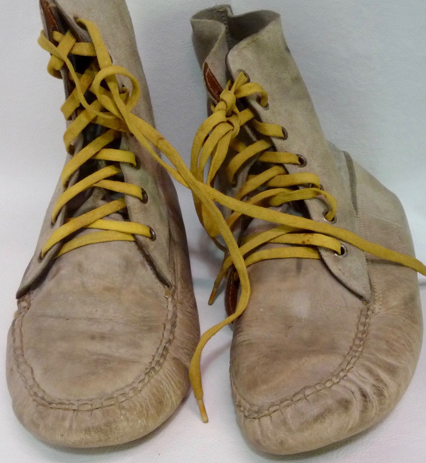 Moccasin man laced leather skin for snowshoeing. Quebec. Canada. 60-70 ...