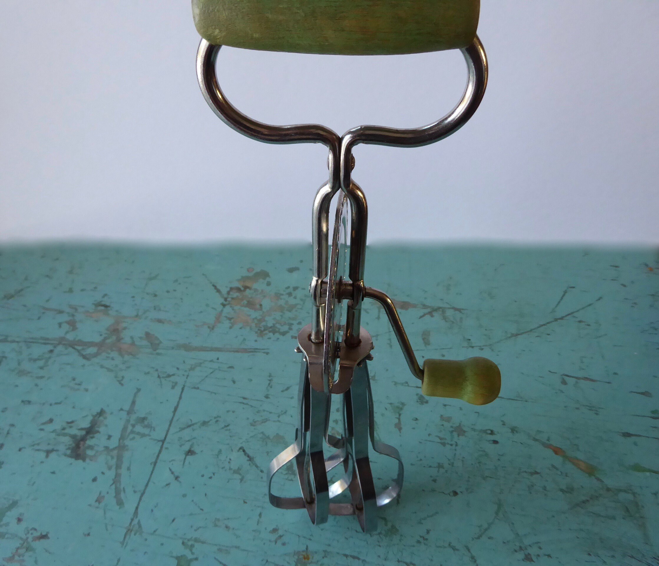 Manual egg beater. Green painted wooden handle. Edlund Company ...