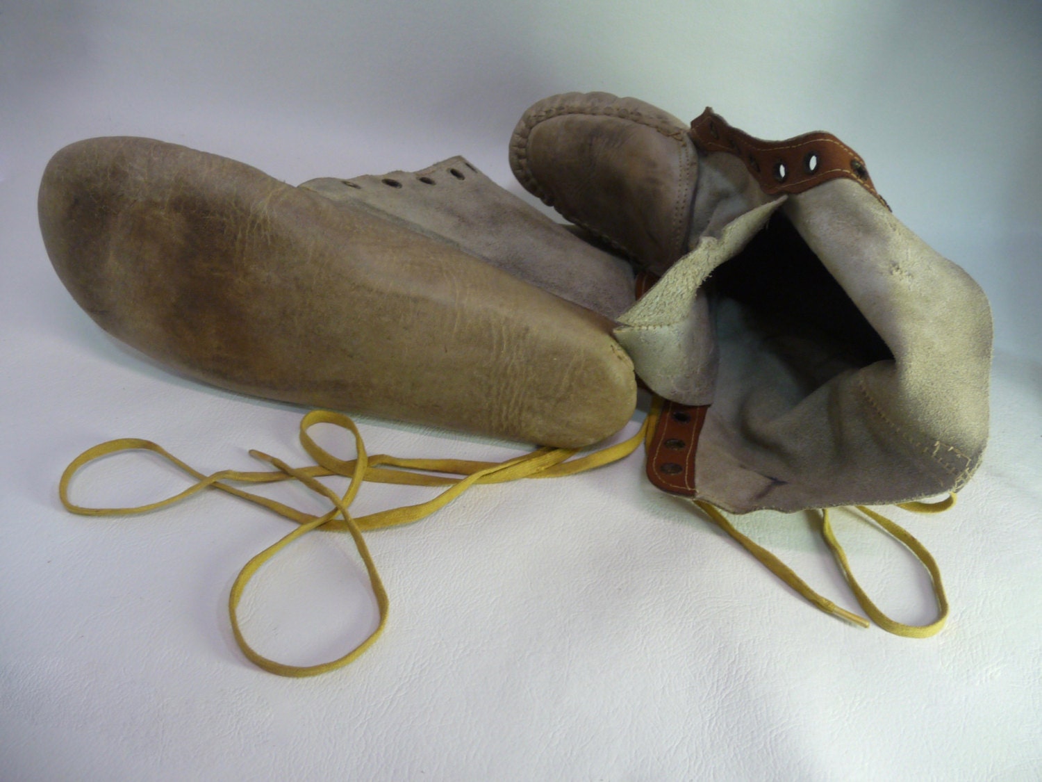 Moccasin man laced leather skin for snowshoeing. Quebec. Canada. 60-70 ...
