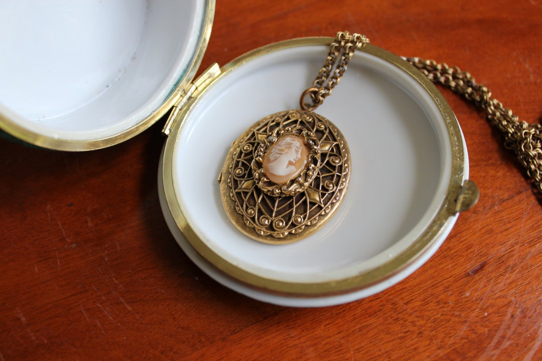 Vintage Shell Cameo Locket in a Gold Tone Filigree Setting on a Vintage ...