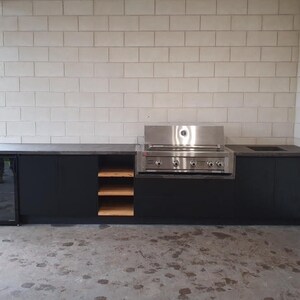 Outdoor Kitchen Concrete Benchtops With Black Weatherproof Cabinetry ...