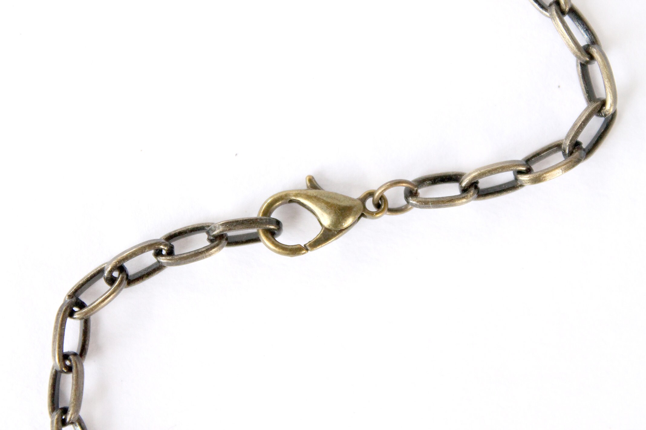 A Worn Volume - Mini Book Chain Necklace in Brown, Red, and Yellow ...