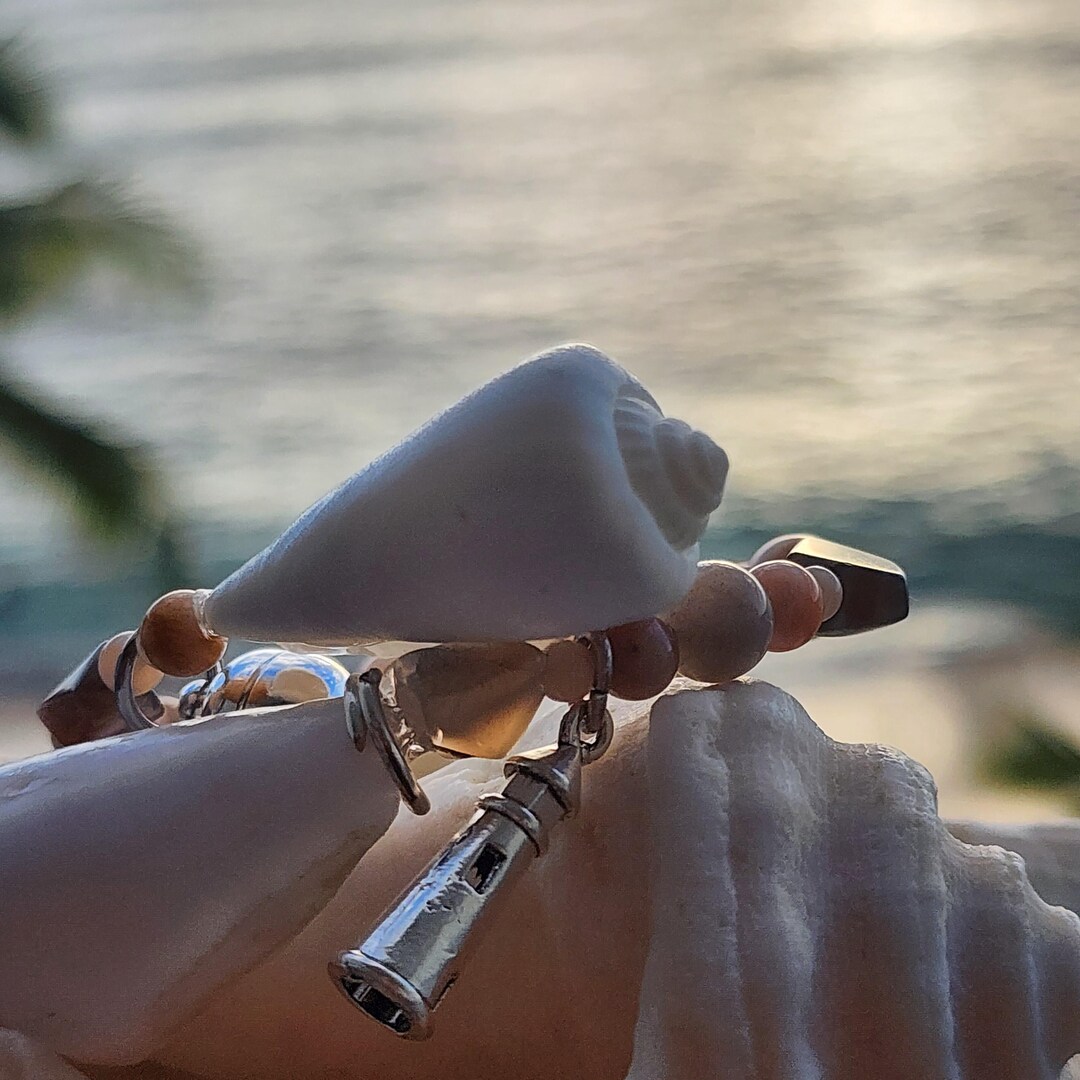 ABC Cone Shells With Lighthouse Charm and Sunstone. - Etsy