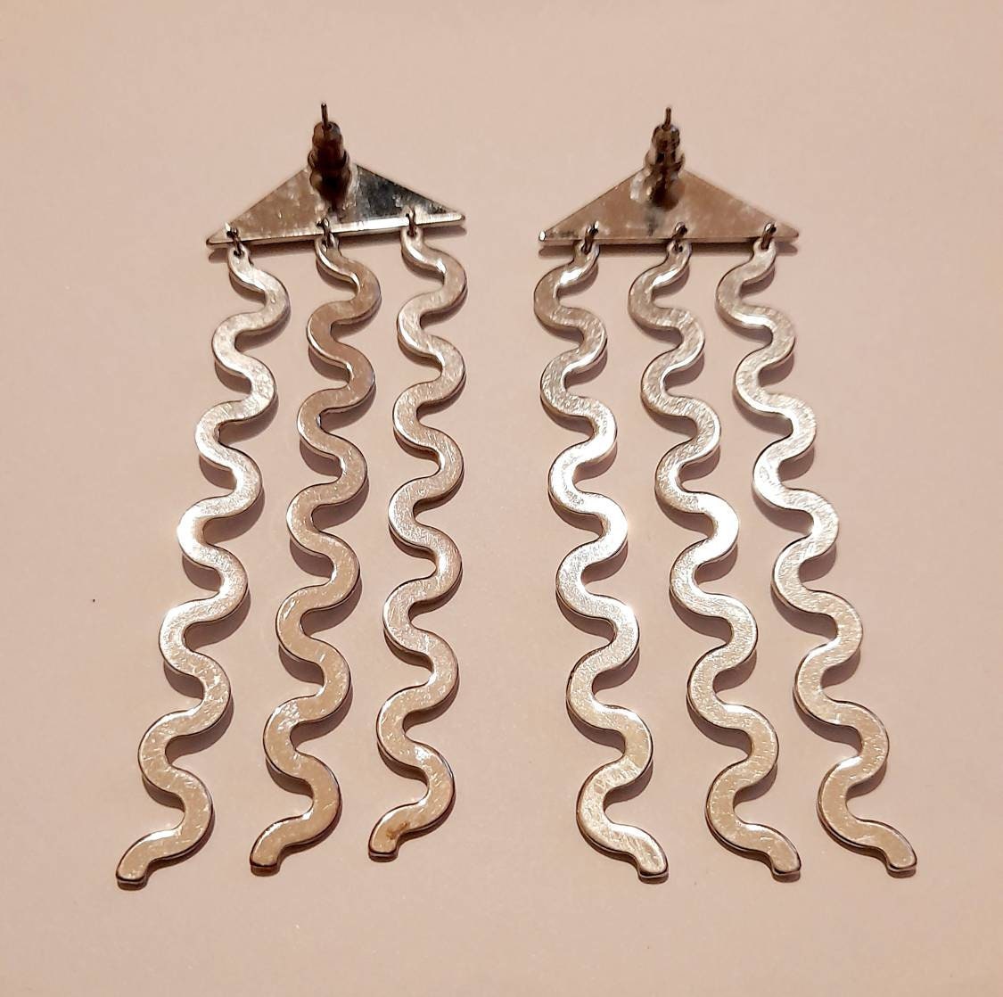 Orejas largas perforadas con crome con colgantes espirales - Etsy España