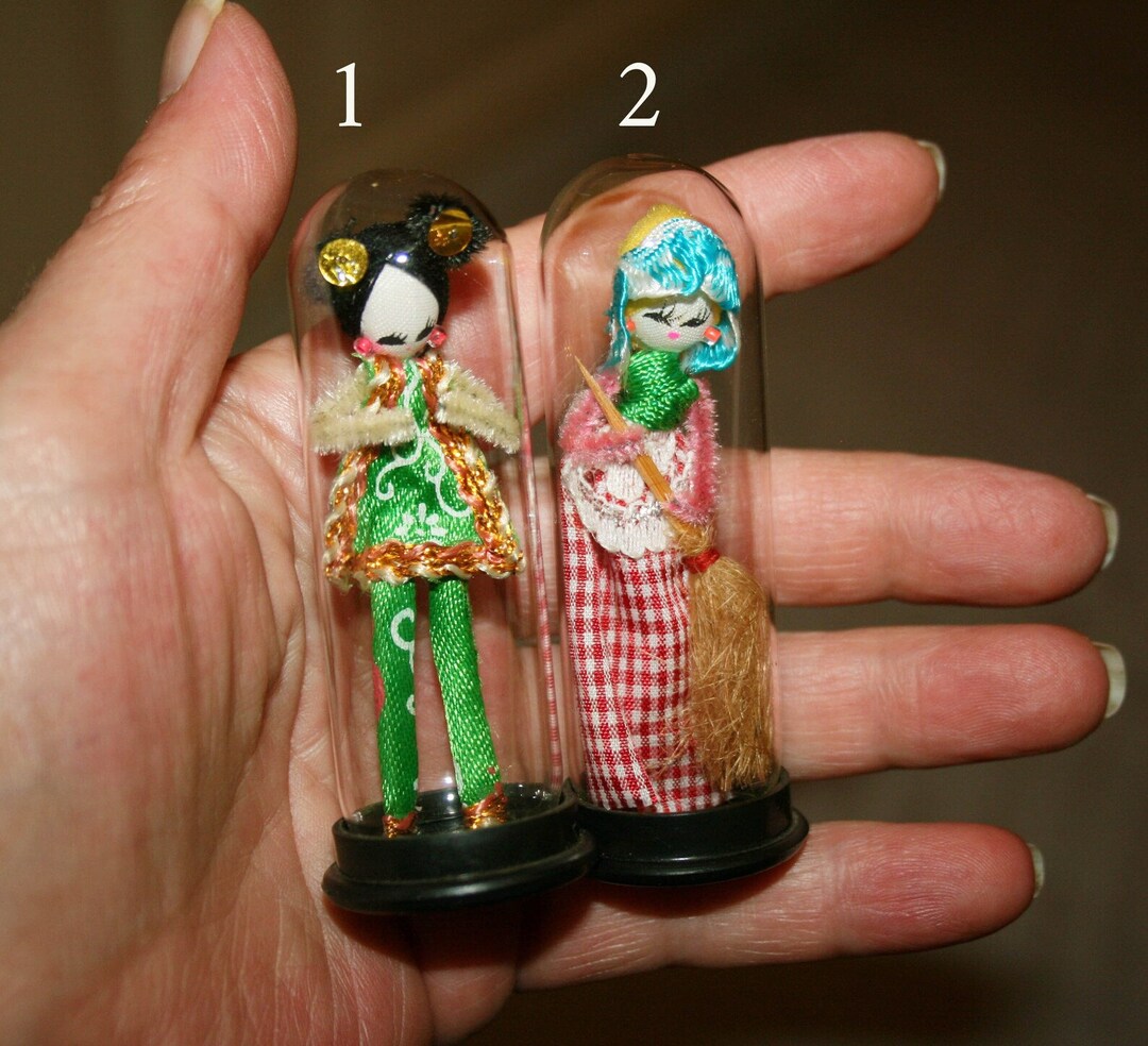 Doll Figurines Under a Glass Dome Bell - Collectible Figurines ...