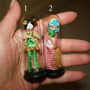 Doll Figurines Under a Glass Dome Bell - Collectible Figurines ...