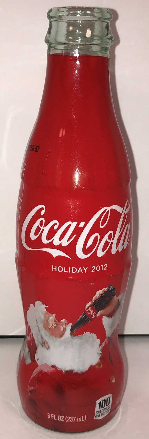 Empty Coca Cola Plastic Bottle