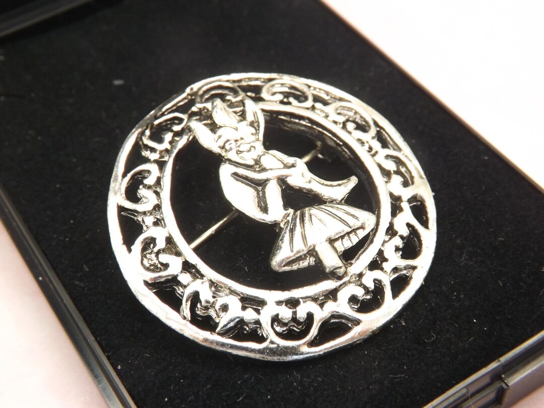 A Lovely Round Cornish Pixie Design Brooch in Openwork Silvertone Metal ...